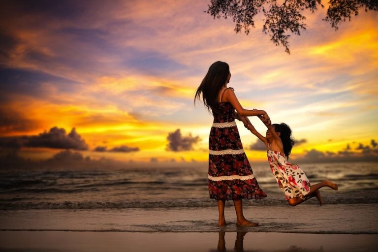 Mother's Perceived Social Status Affects Her Child's Brain Development