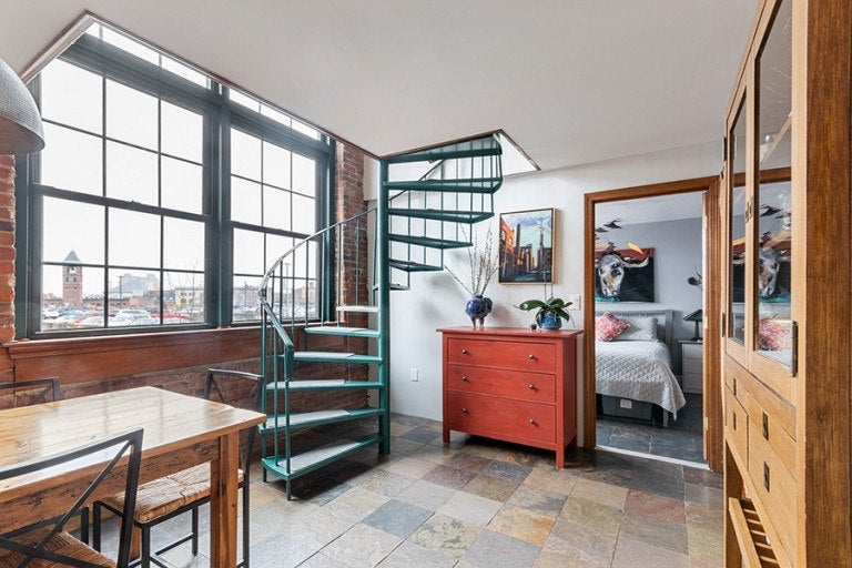 On the Market: A Greenhouse-Like Loft in a Converted Mill Building